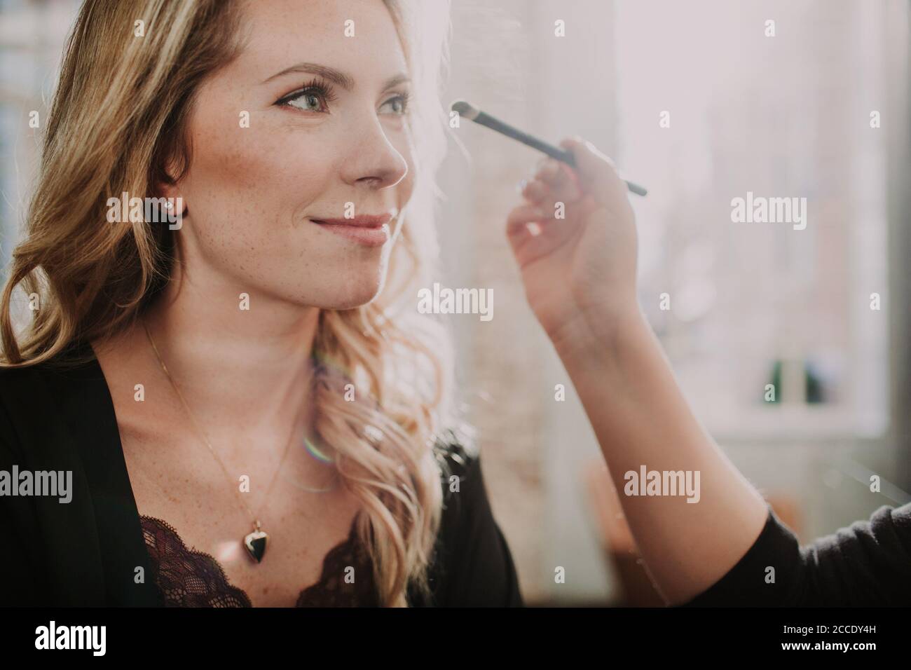 Woman is made up hi-res stock photography and images - Alamy