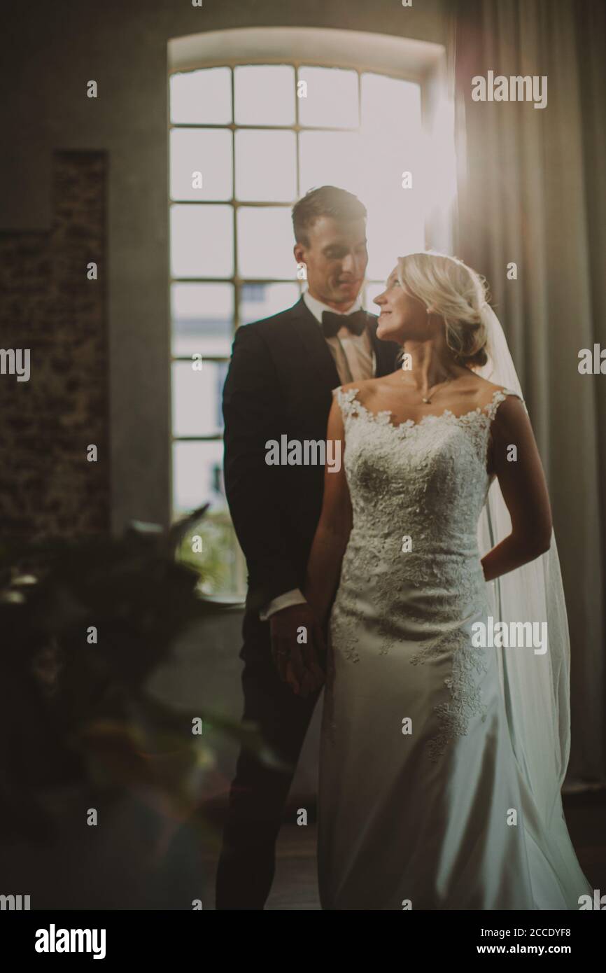 Newlyweds, happy, in love Stock Photo - Alamy