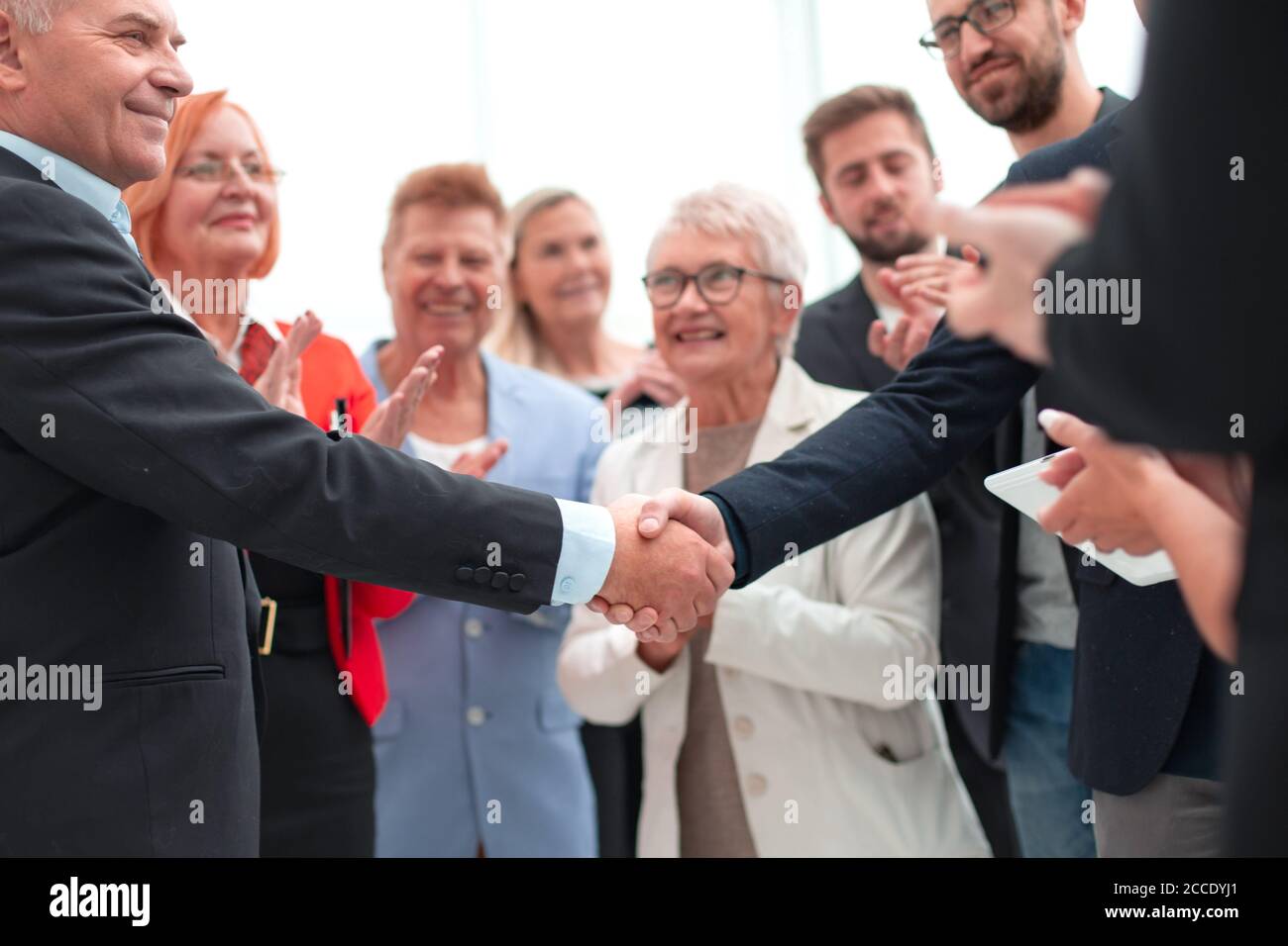 Businessmen handshaking greeting gesture project hi-res stock ...