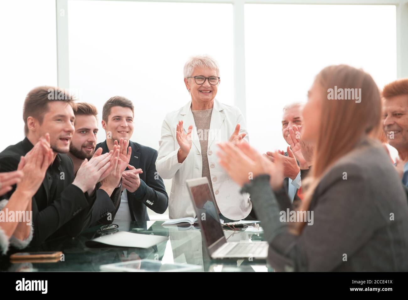 Business team clapping in boardroom hi-res stock photography and images ...