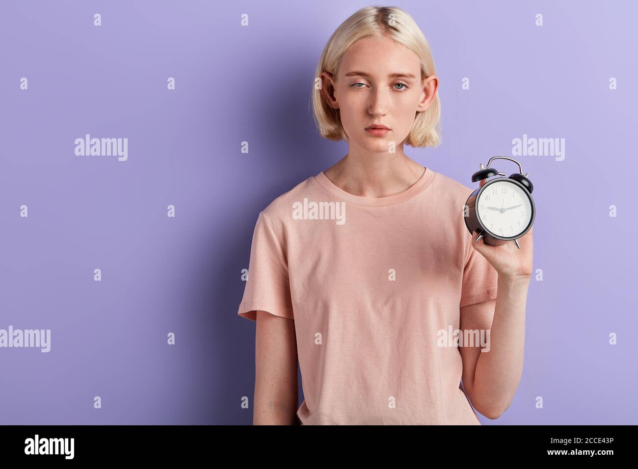 unhappy depressed lazy girl doesn't want to wake up in the morning ...