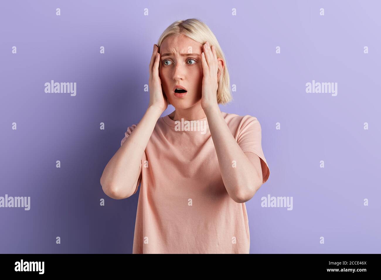 woman being afraid of big prices, close up side view photo. scared girl ...