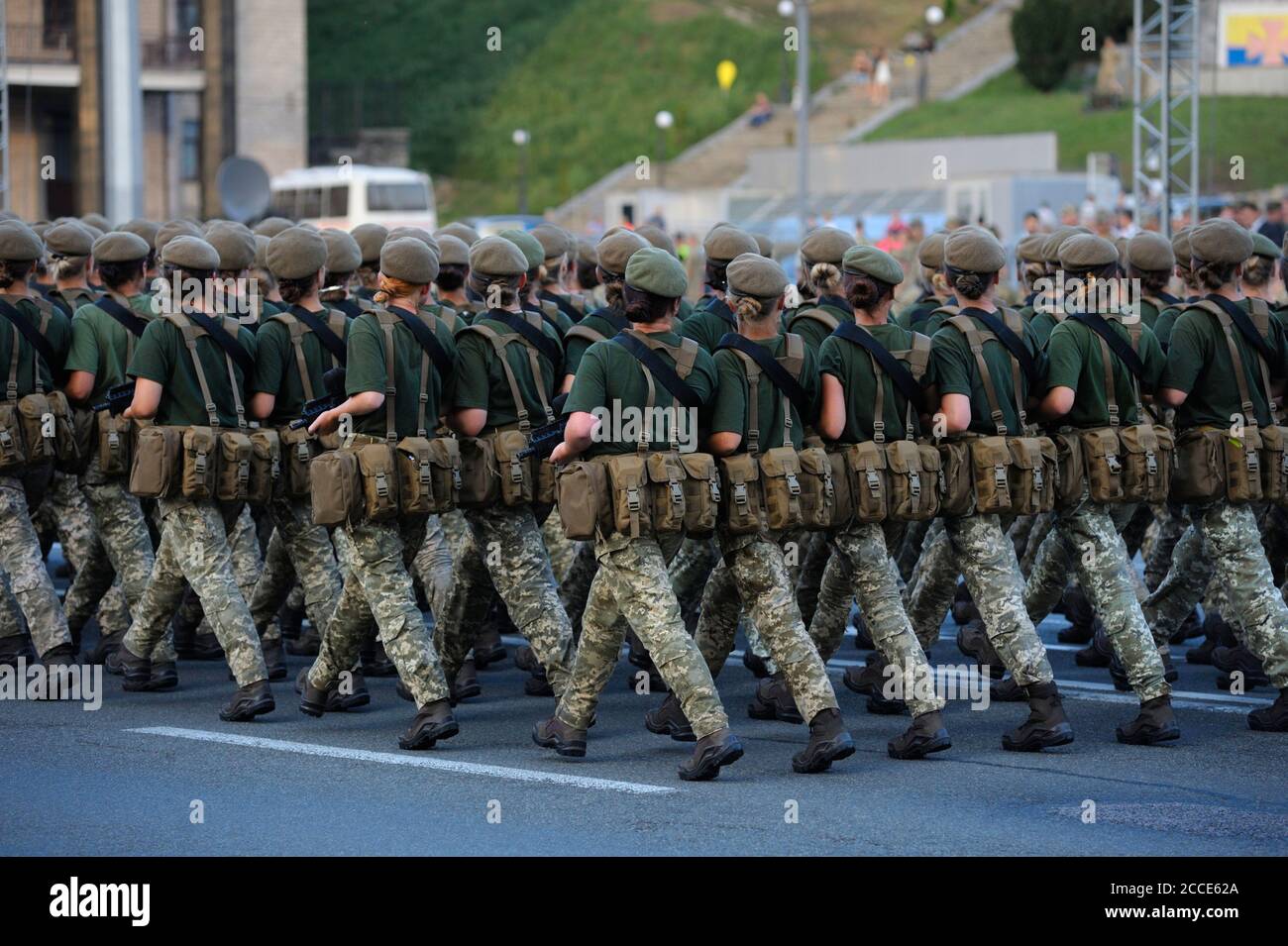 Female soldiers of a womens battalion marching on a square with machine ...