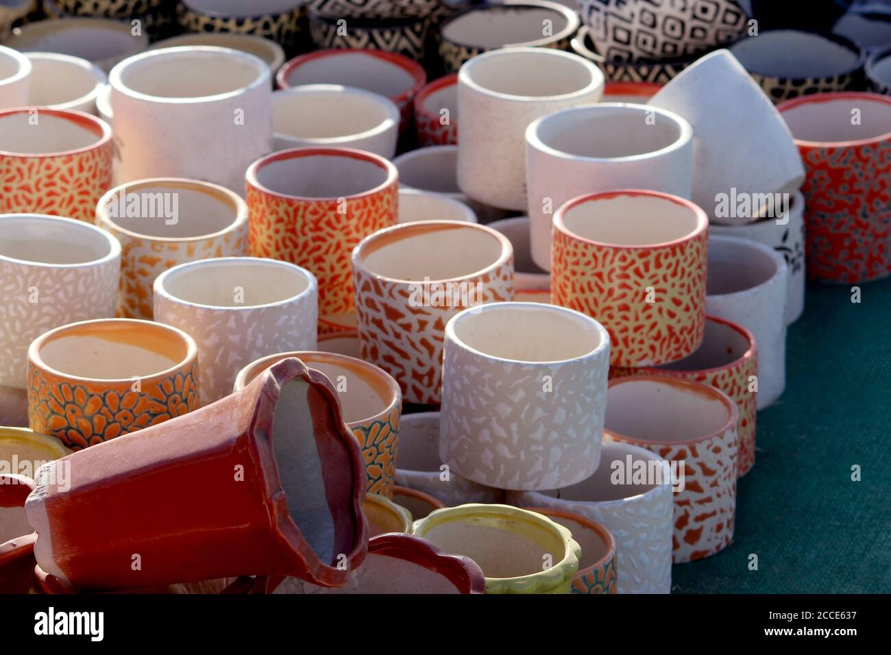 colorful crockery vase, handcrafted traditional clay pot in market ...