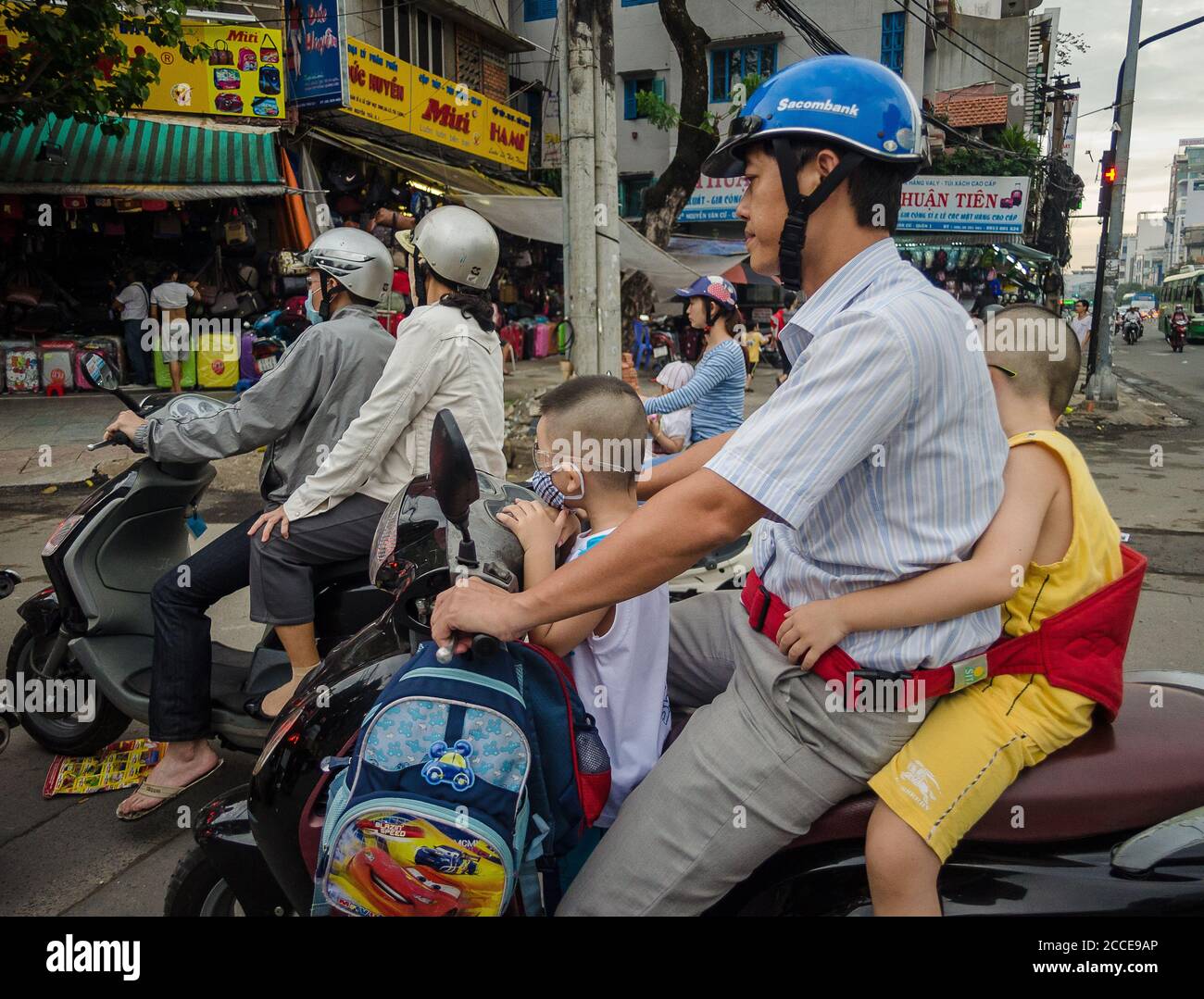Taking the kids home from school in Ho Chi Minh City/Saigon Stock Photo ...