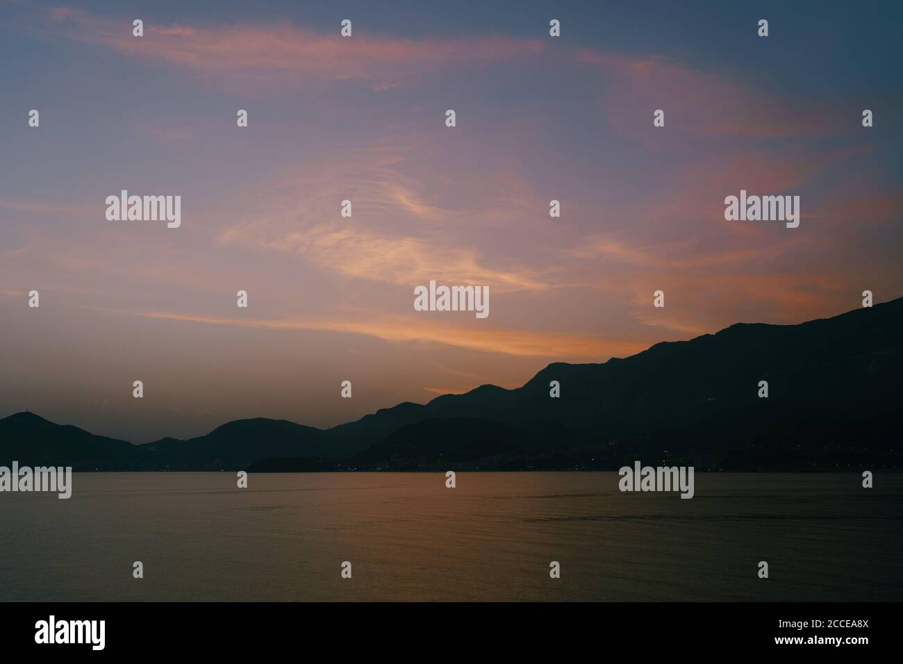 Twilight after sunset, over the mountains and the sea Stock Photo - Alamy