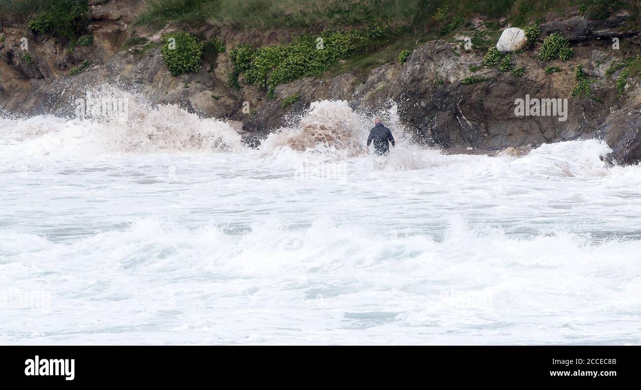Man caught by spring tide hi-res stock photography and images - Alamy