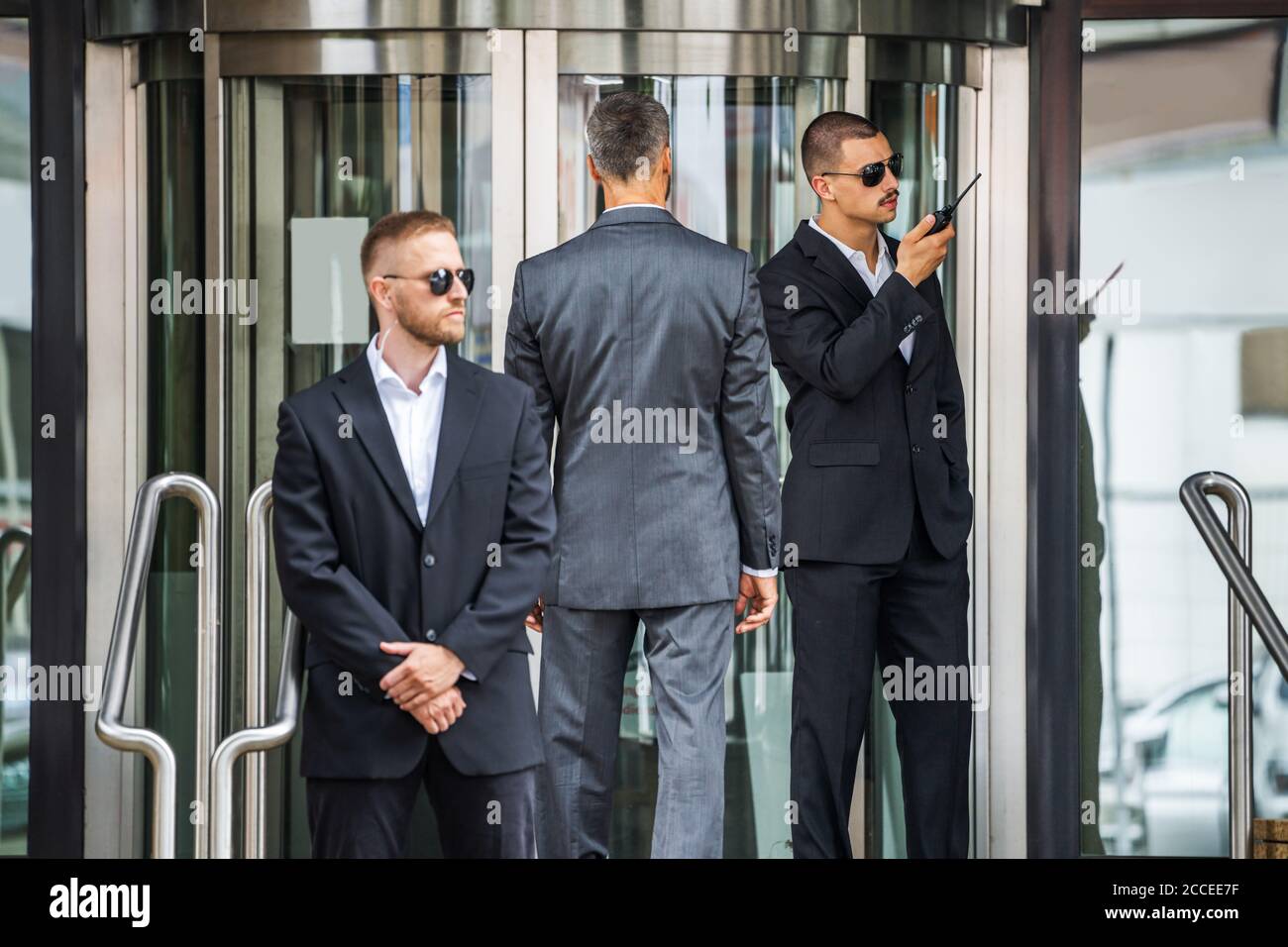 Security Guard Service Protecting Business Man Outside Stock Photo - Alamy