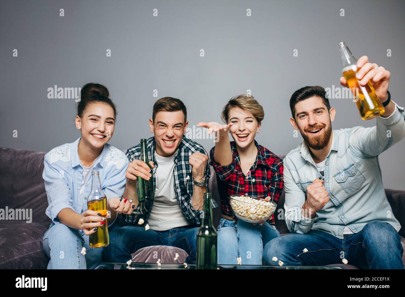 positive emotions in front of the screen of television. close up photo ...