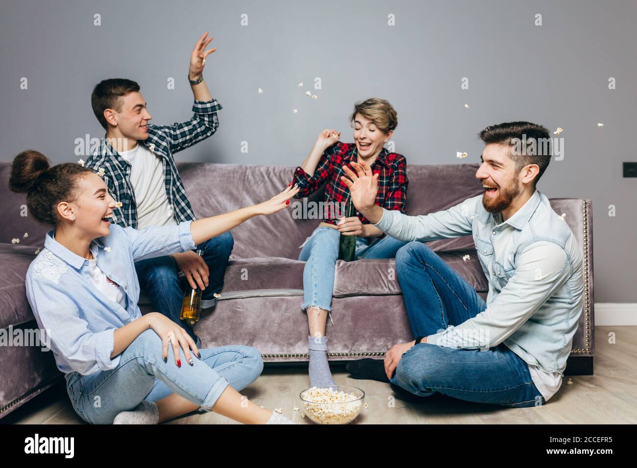 Woman Throwing Popcorn High Resolution Stock Photography and Images - Alamy