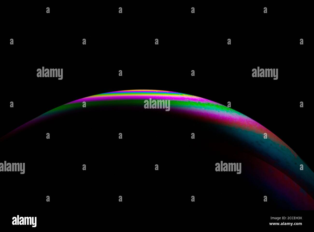 Colorful detail of an artificially illuminated bubble, detail of ...
