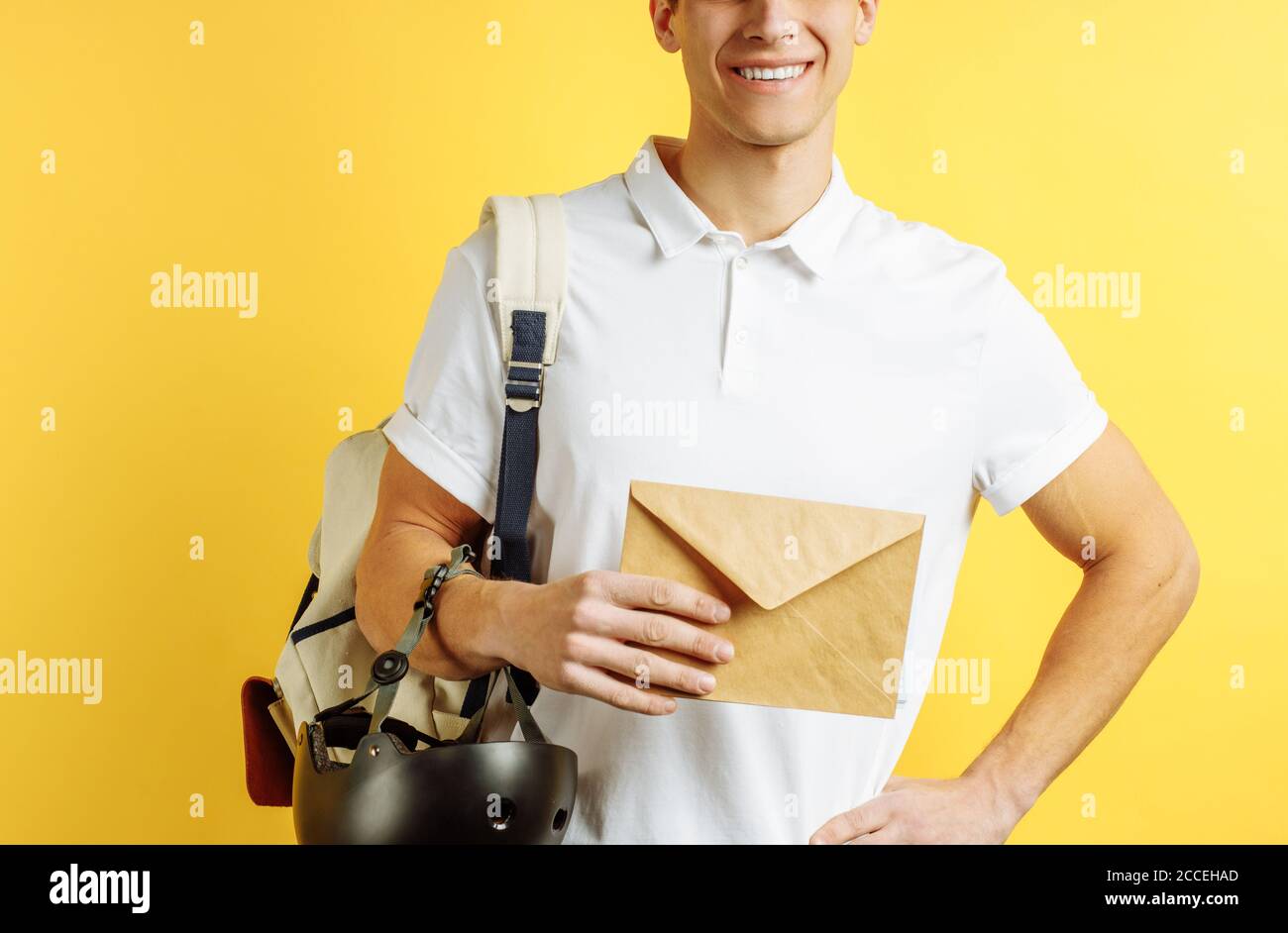 cropped smiling young unrecognizable man in white t-shirt uniform ...