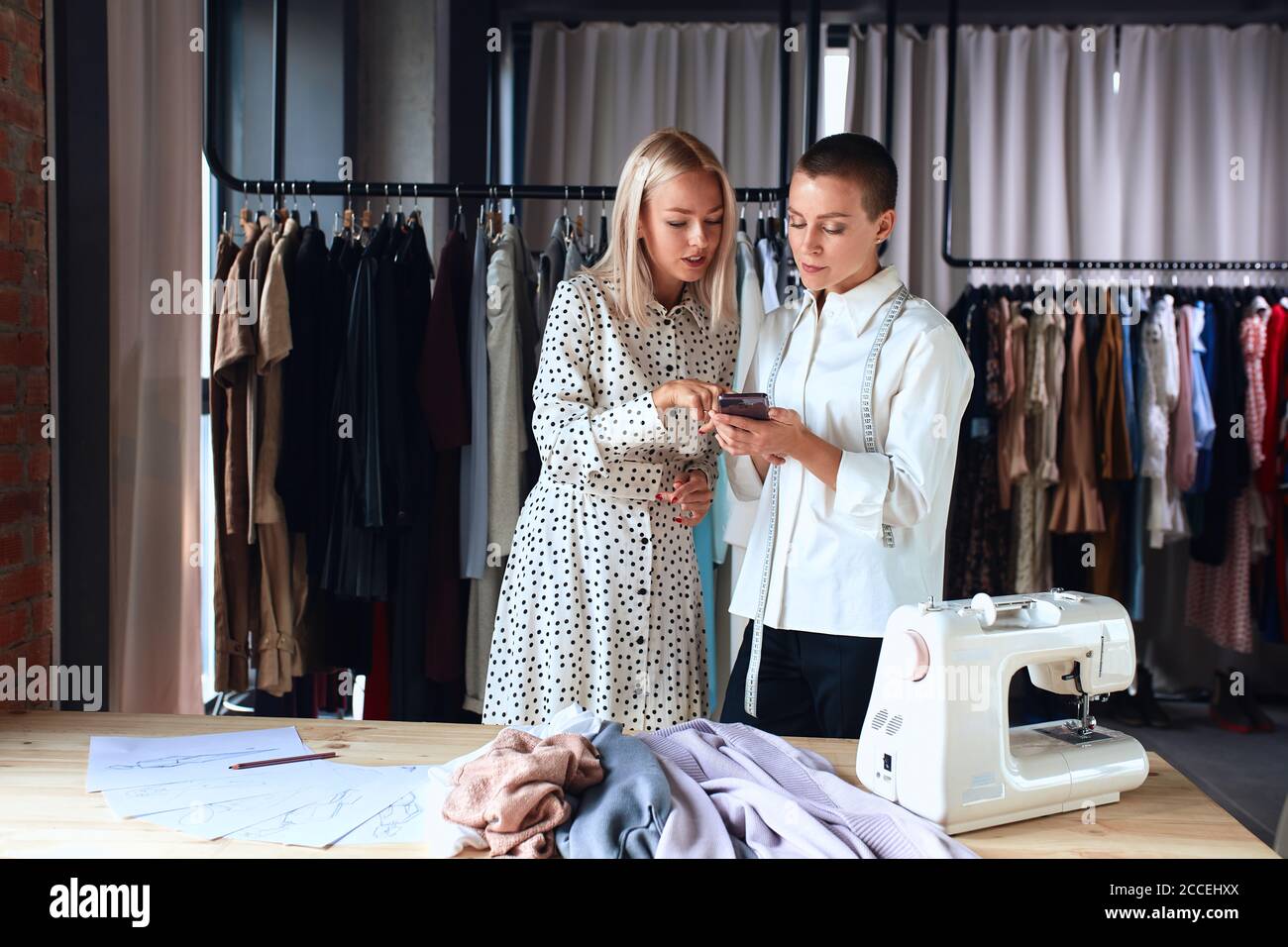 Stylist client woman fashion dress designer hi-res stock photography ...