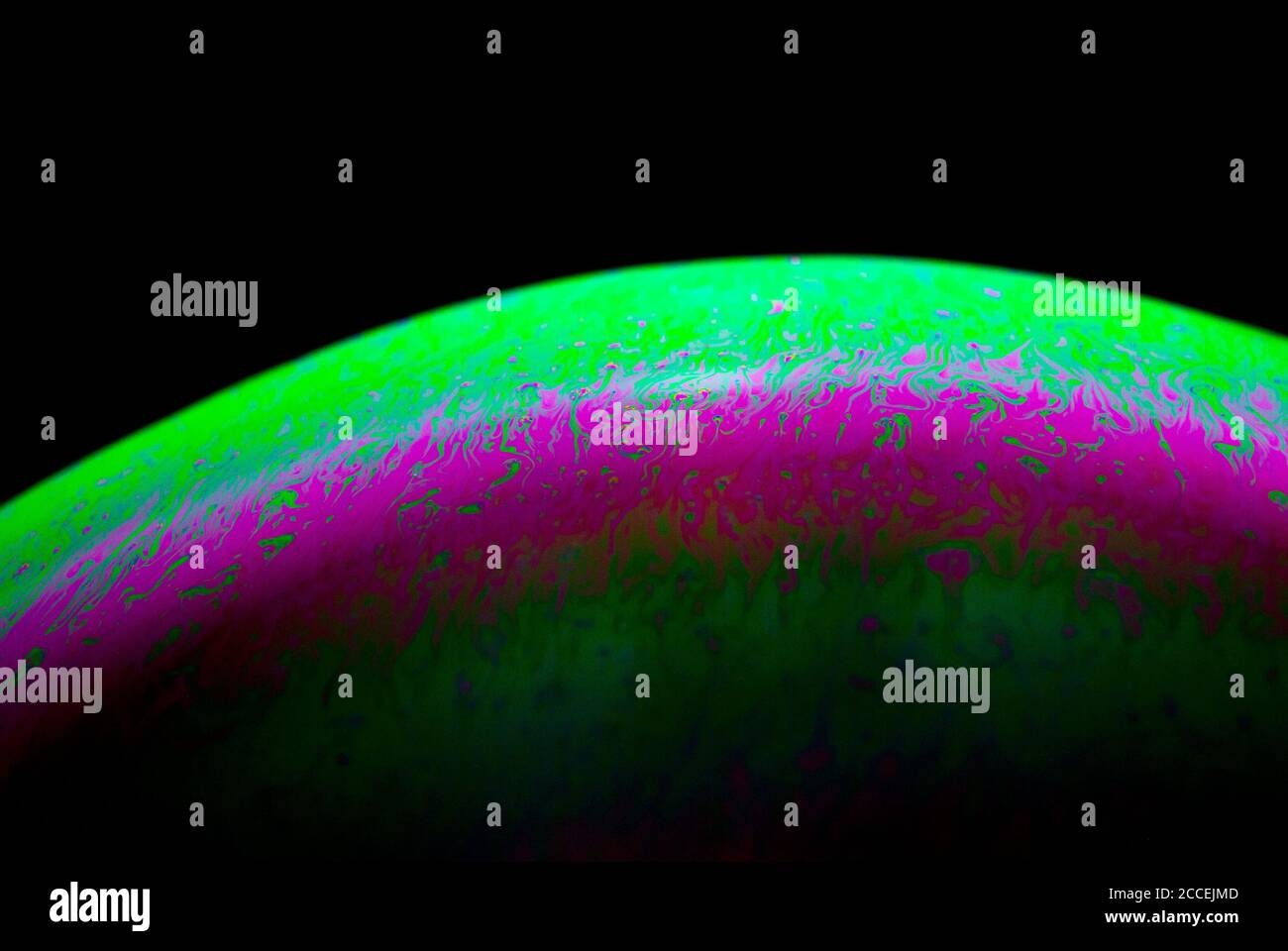 Colorful detail of an artificially illuminated bubble, detail of ...