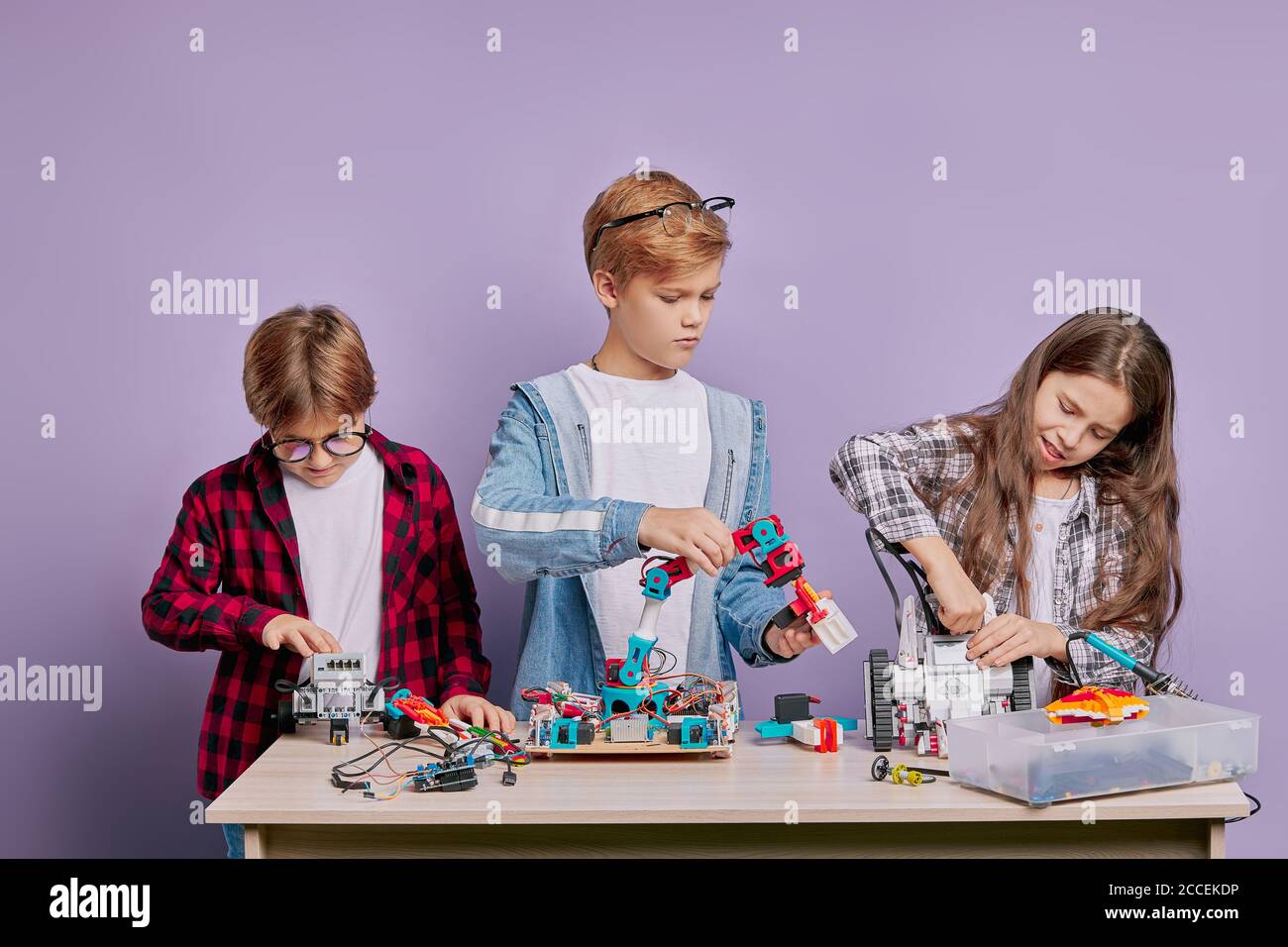 portrait of brainy children interested in engineering, robotics, future ...
