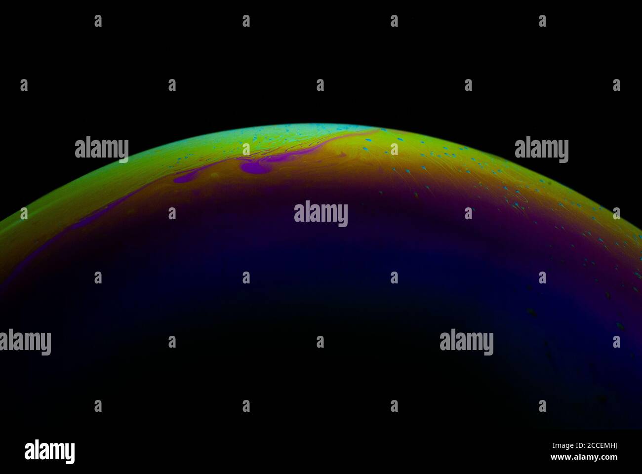 Colorful detail of an artificially illuminated bubble, detail of ...