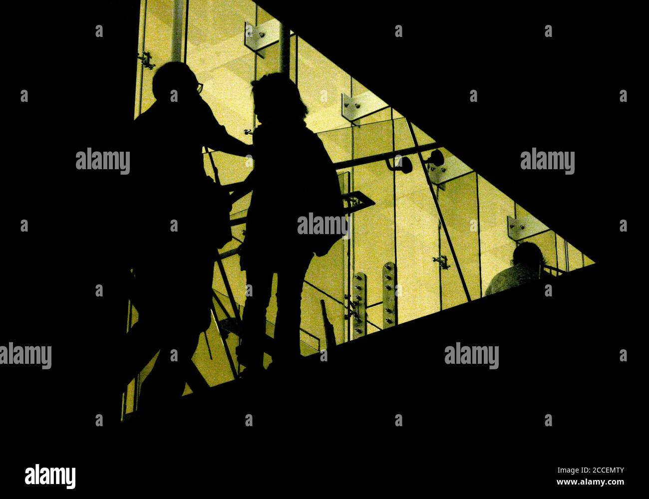 Triangle drama - People in silhouette discuss something of great ...