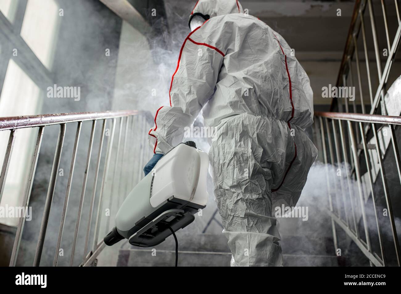 professional disinfector in an NBC personal protective equipment ppe ...