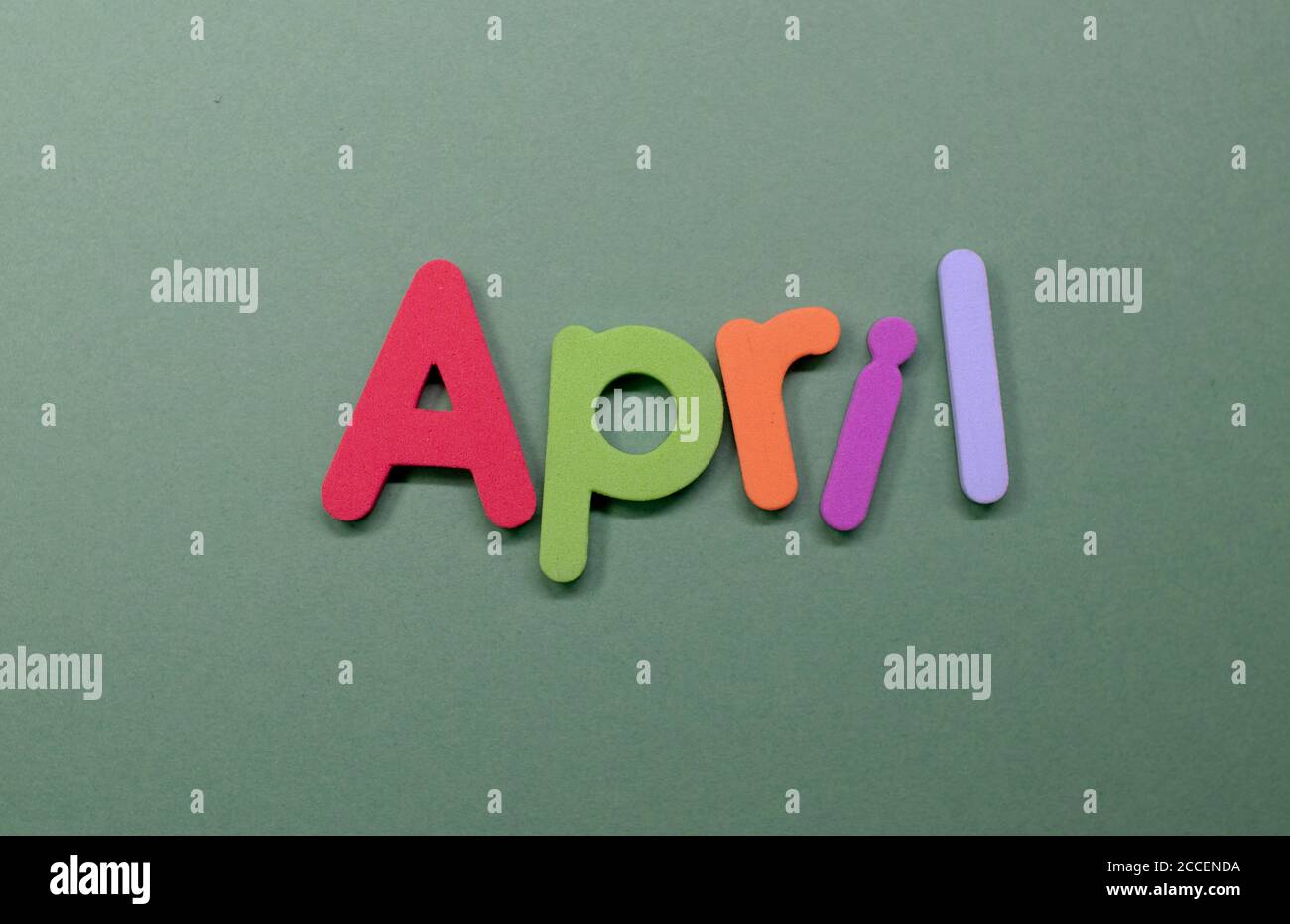Word April written with color sponge Stock Photo - Alamy