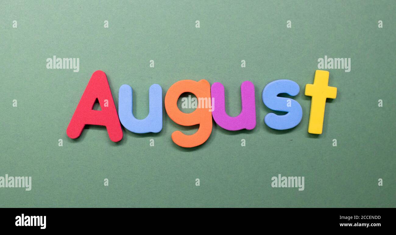 Word "August" written with color sponge Stock Photo - Alamy
