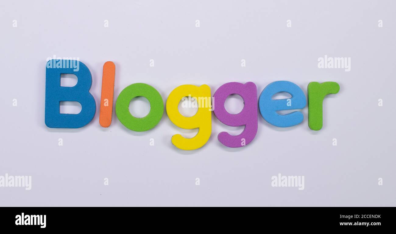 Word "Blogger" written with color sponge Stock Photo - Alamy