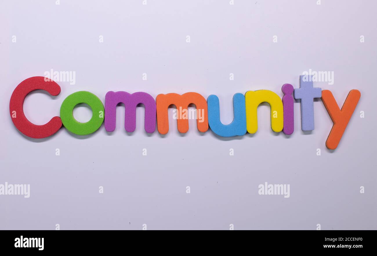 Word "Community" written with color sponge Stock Photo - Alamy