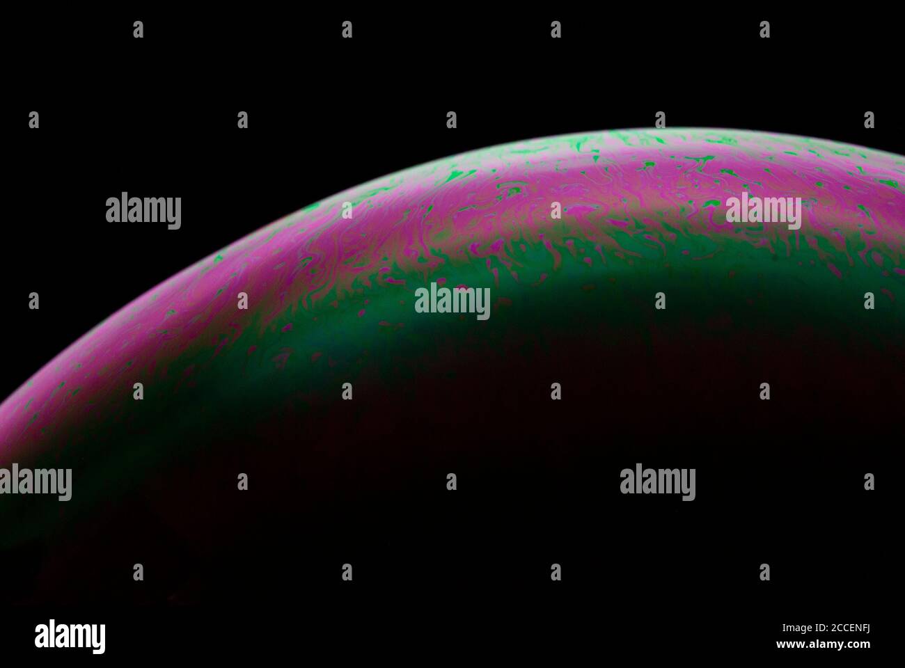 Colorful detail of an artificially illuminated bubble, detail of ...