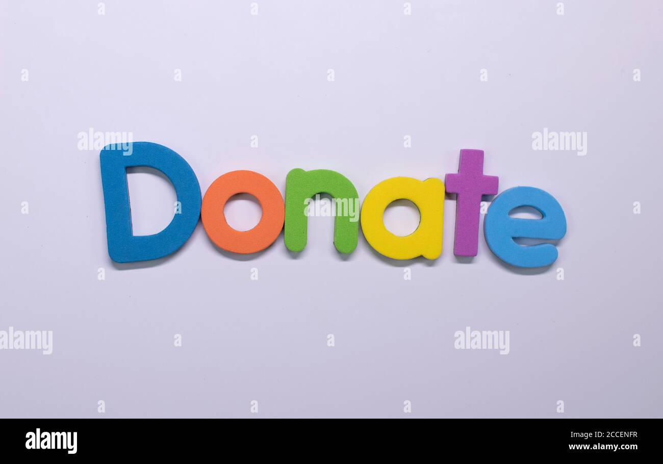 Word "Donate" written with color sponge Stock Photo - Alamy
