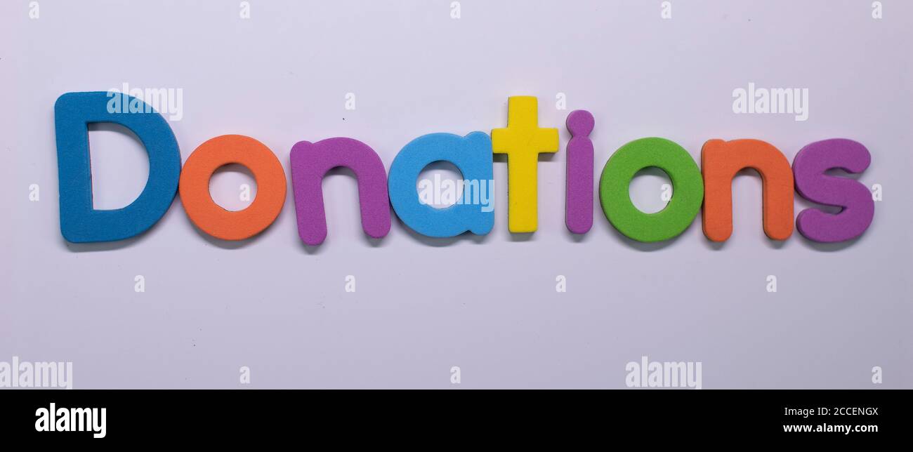 Word "Donations" written with color sponge Stock Photo - Alamy