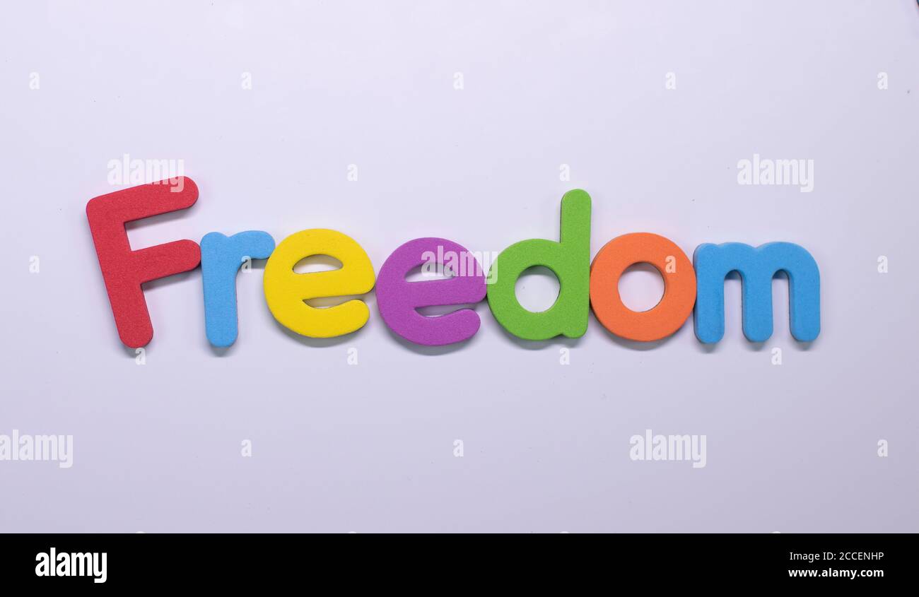 Word "Freedom" written with color sponge Stock Photo - Alamy