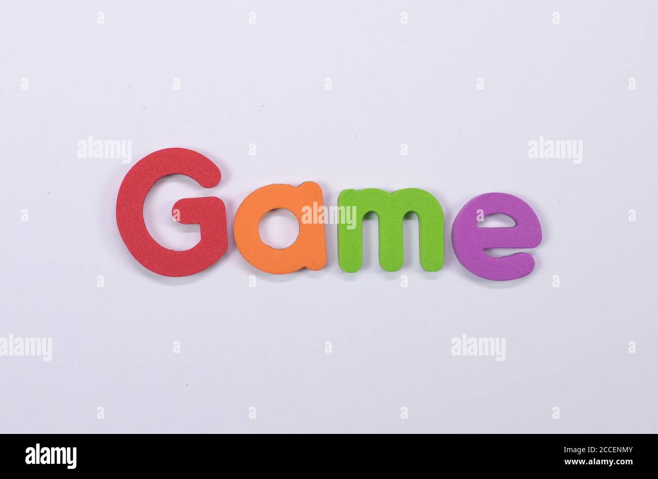 Word Game written with color sponge Stock Photo - Alamy