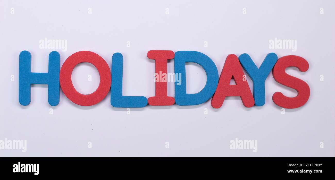Word Holidays written with color sponge Stock Photo - Alamy