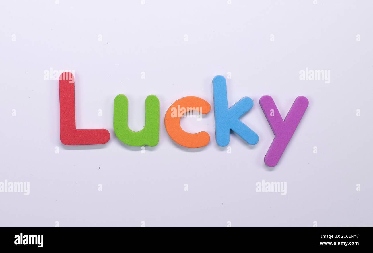 Word Lucky written with color sponge Stock Photo - Alamy