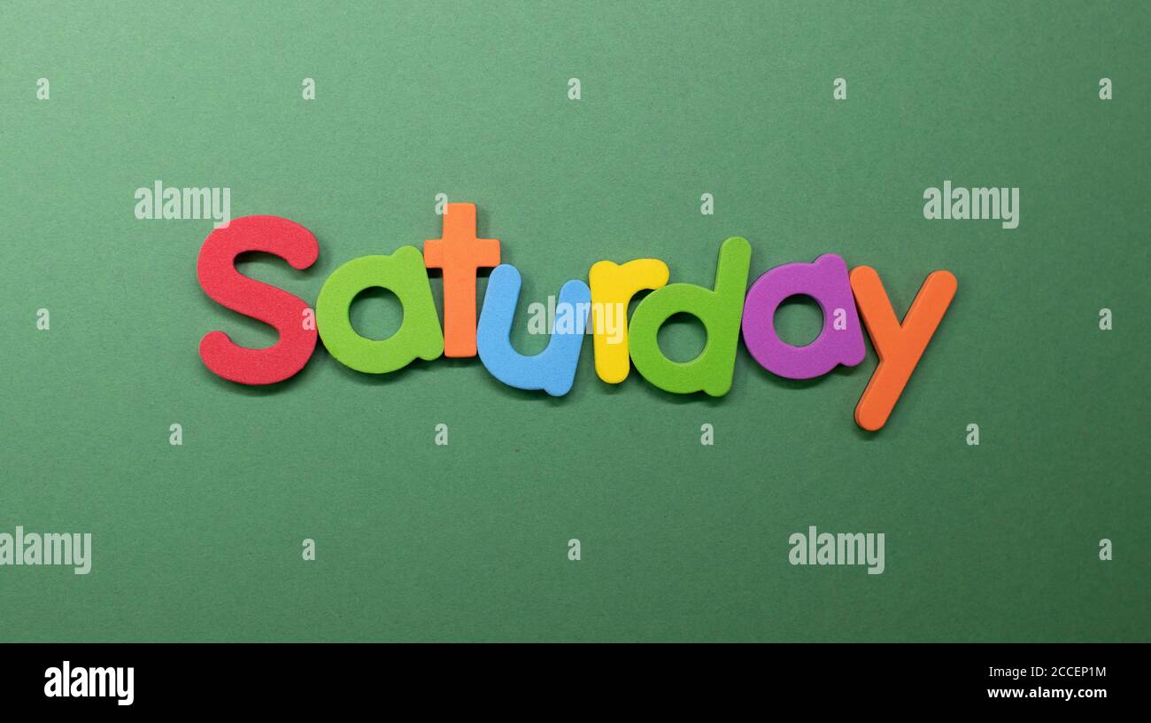 Word Saturday written with color sponge Stock Photo - Alamy