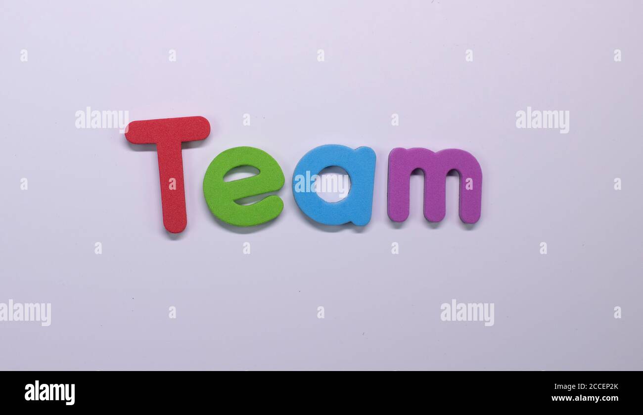 Word Team written with color sponge Stock Photo - Alamy