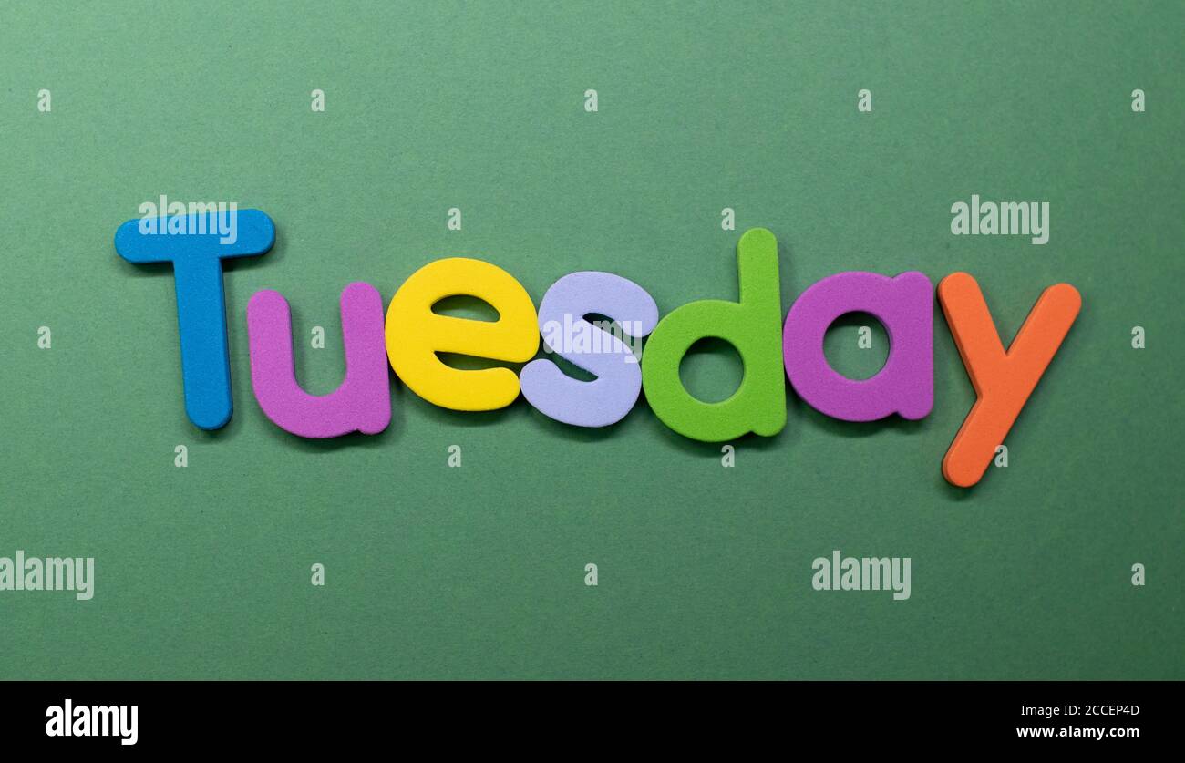 Word Tuesday written with color sponge Stock Photo - Alamy