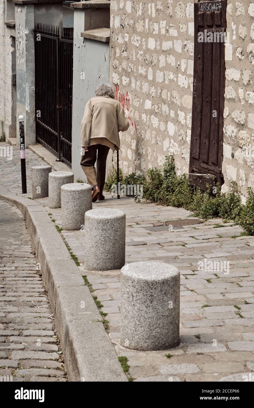 Europe, France, Paris, Montmartre, Steetlife, Old Woman walking on ...