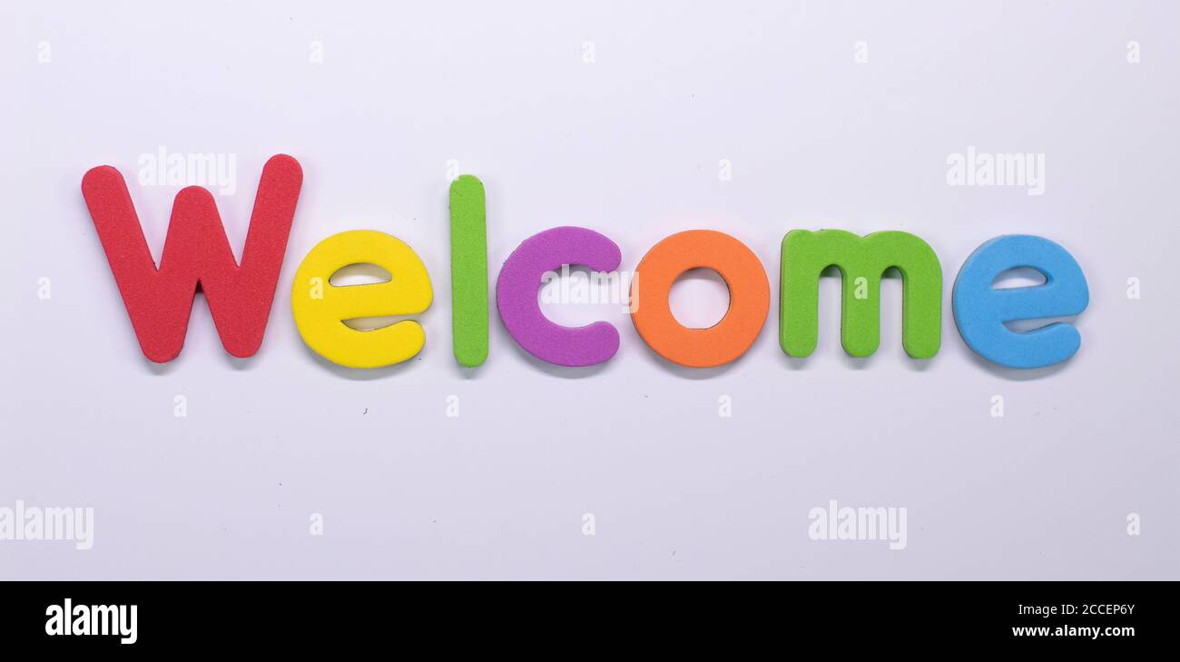 Word Welcome written with color sponge Stock Photo - Alamy