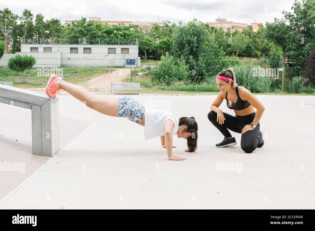 Girl doing push ups hi-res stock photography and images - Alamy