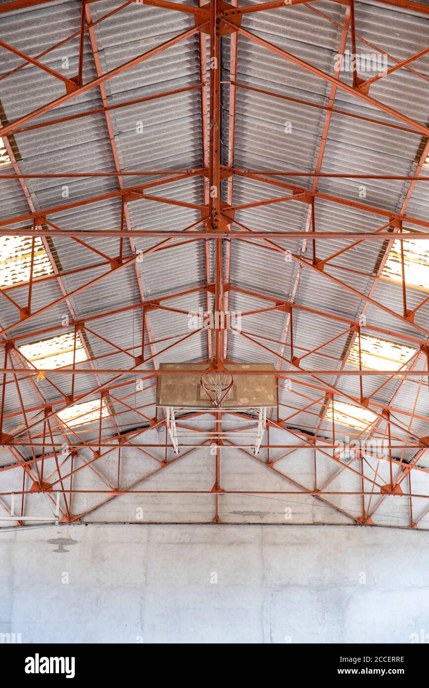 Roof of a sports hall with a basketball basket from the inside with ...