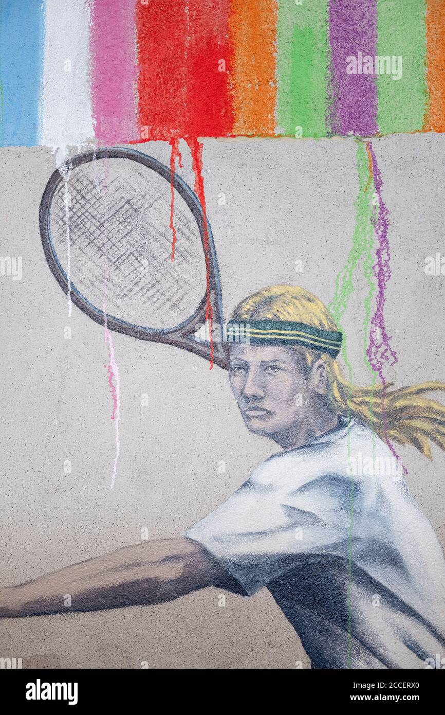 Mural painting of a tennis player with colored stripes above it Stock ...