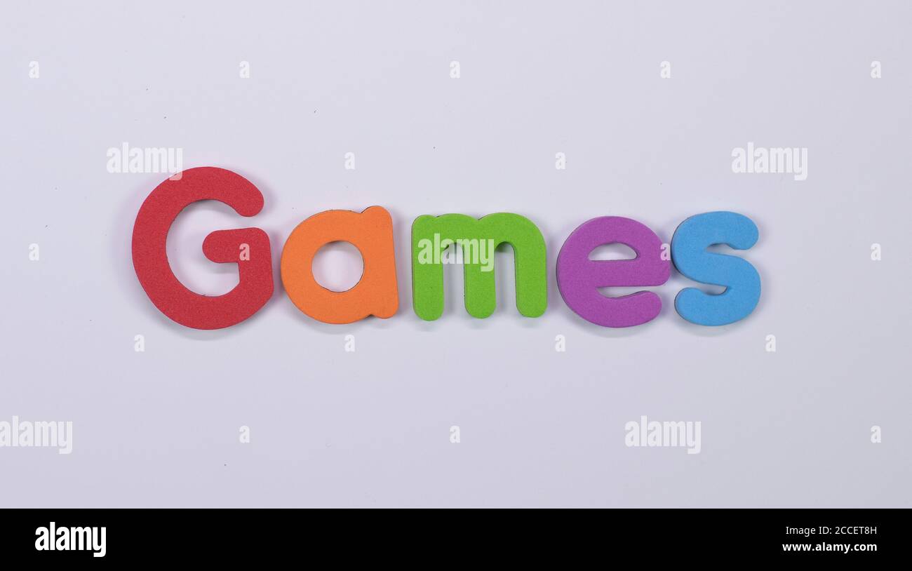 Word Games written with color sponge Stock Photo - Alamy