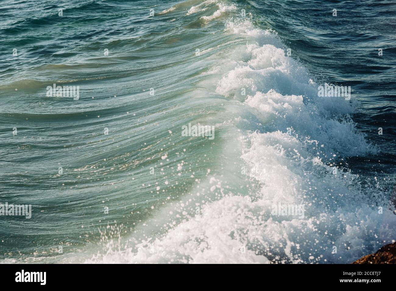Atlantic ocean wave splashing, shot from above Stock Photo - Alamy