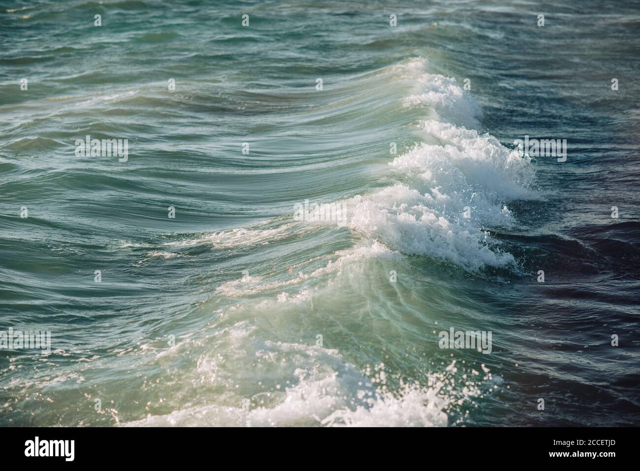 Atlantic ocean wave splashing, shot from above Stock Photo - Alamy
