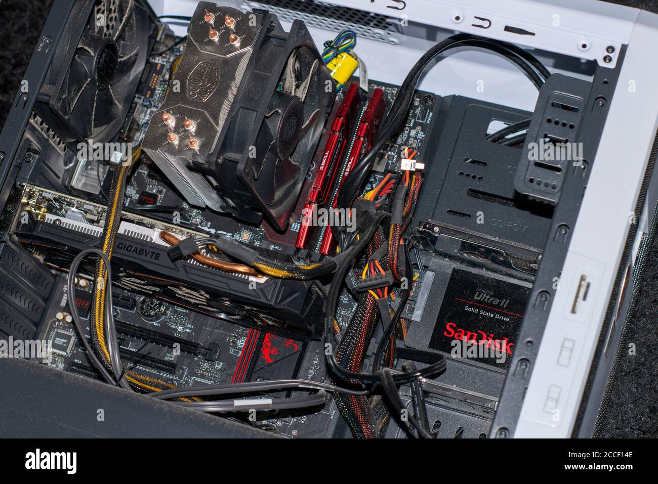Dust inside opened gaming computer for maintenance purposes Stock Photo ...