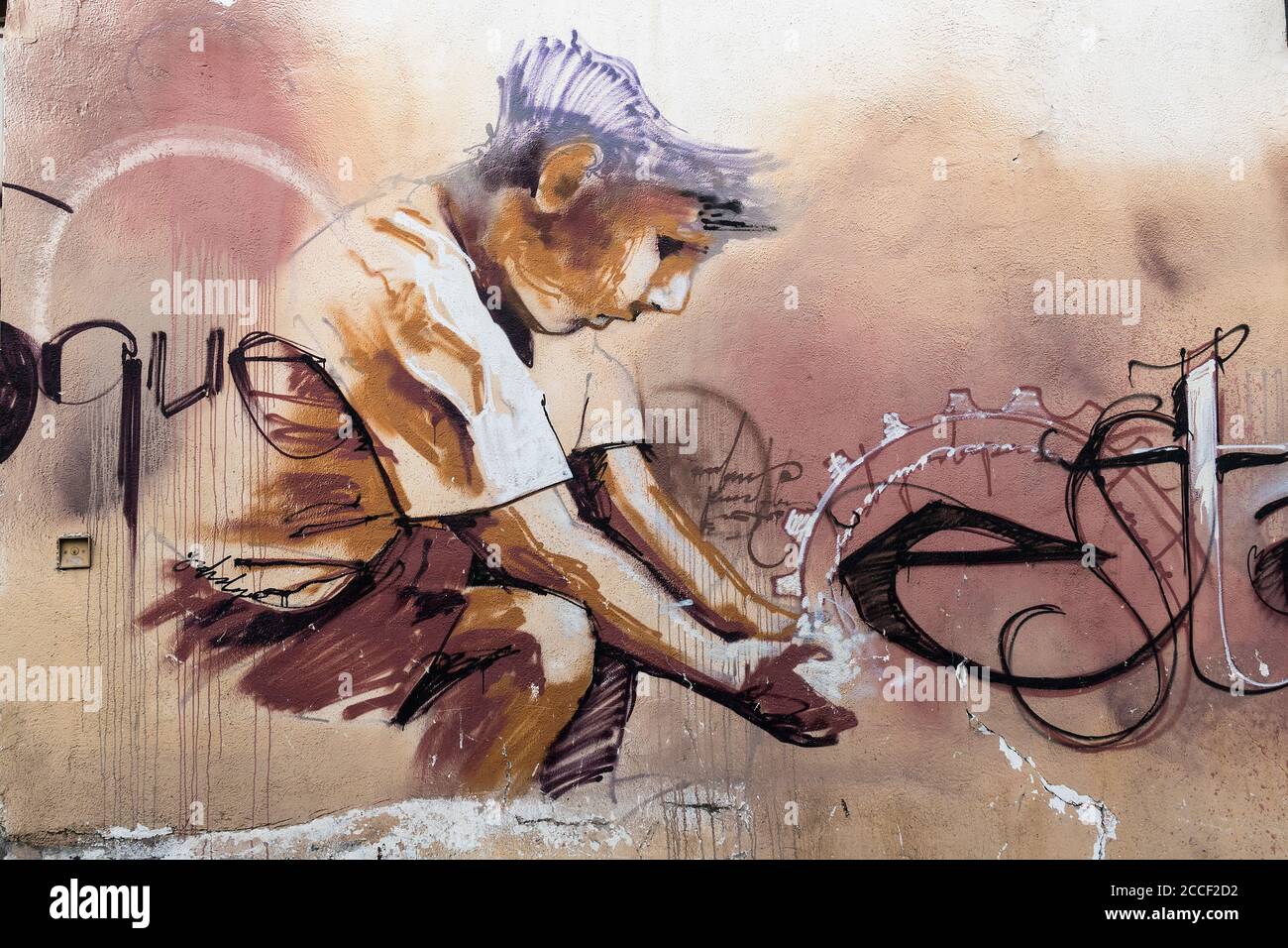 Spain, Granada, Realejo, street art by artist Raul Ruiz, boy Stock ...