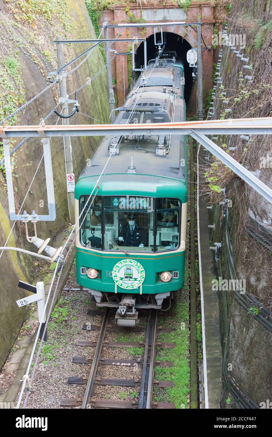 Enoden Type 1000 at Gokurakuji Tunnel in Kamakura, Kanagawa, Japan. The ...