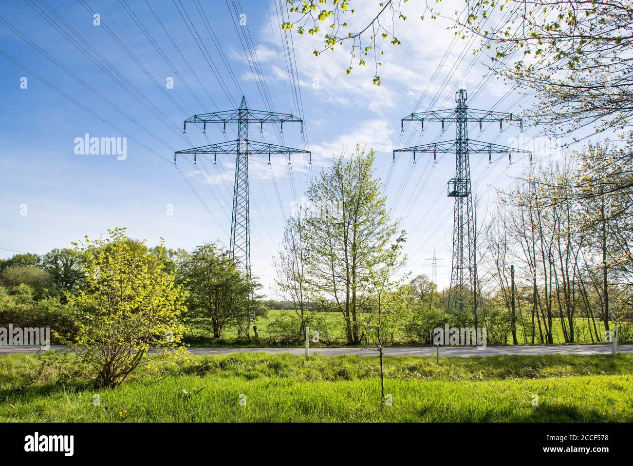 High voltage pylons in the countryside Stock Photo - Alamy