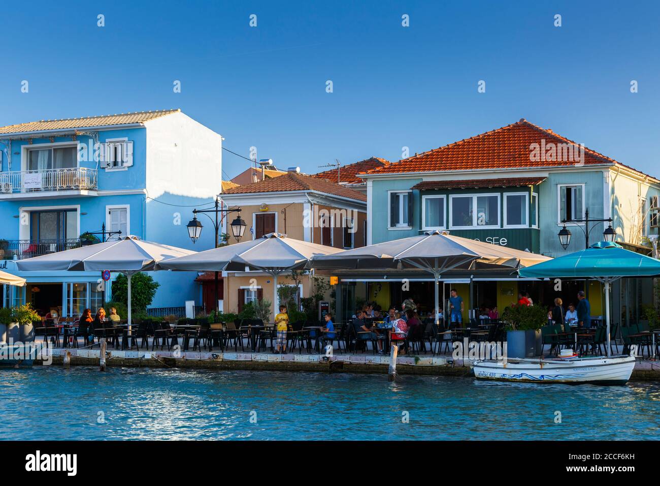Coffee shops and restaurants in the harbour of Lefkada town, Greece ...