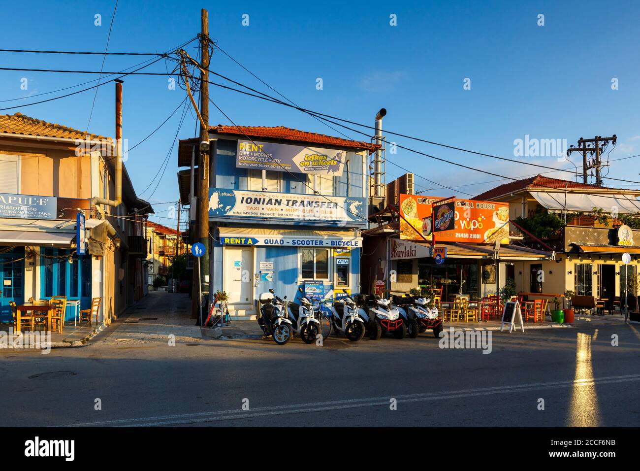 Architecture at the seafront of Lefkada harbour in Greece Stock Photo ...